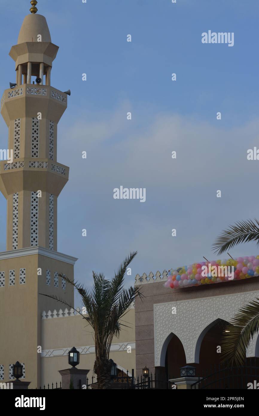Cairo, Egypt, April 21 2023: Throwing balloons for kids and children ...