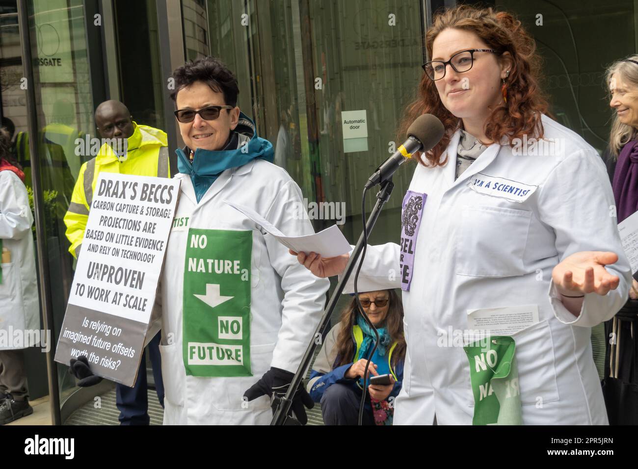 London, UK. 26 April 2023. A scientist outside the AGM of Drax, the UK ...