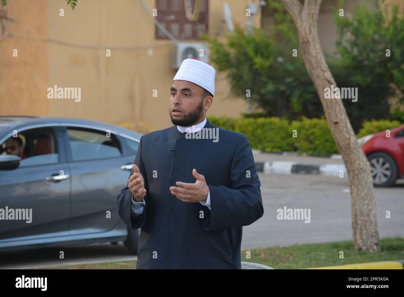 Cairo, Egypt, April 21 2023: A mosque preacher Imam performs Eid Al ...
