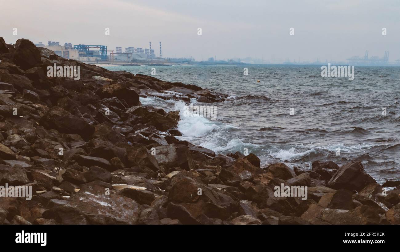 Sea waves with sky and rocks Stock Photo - Alamy