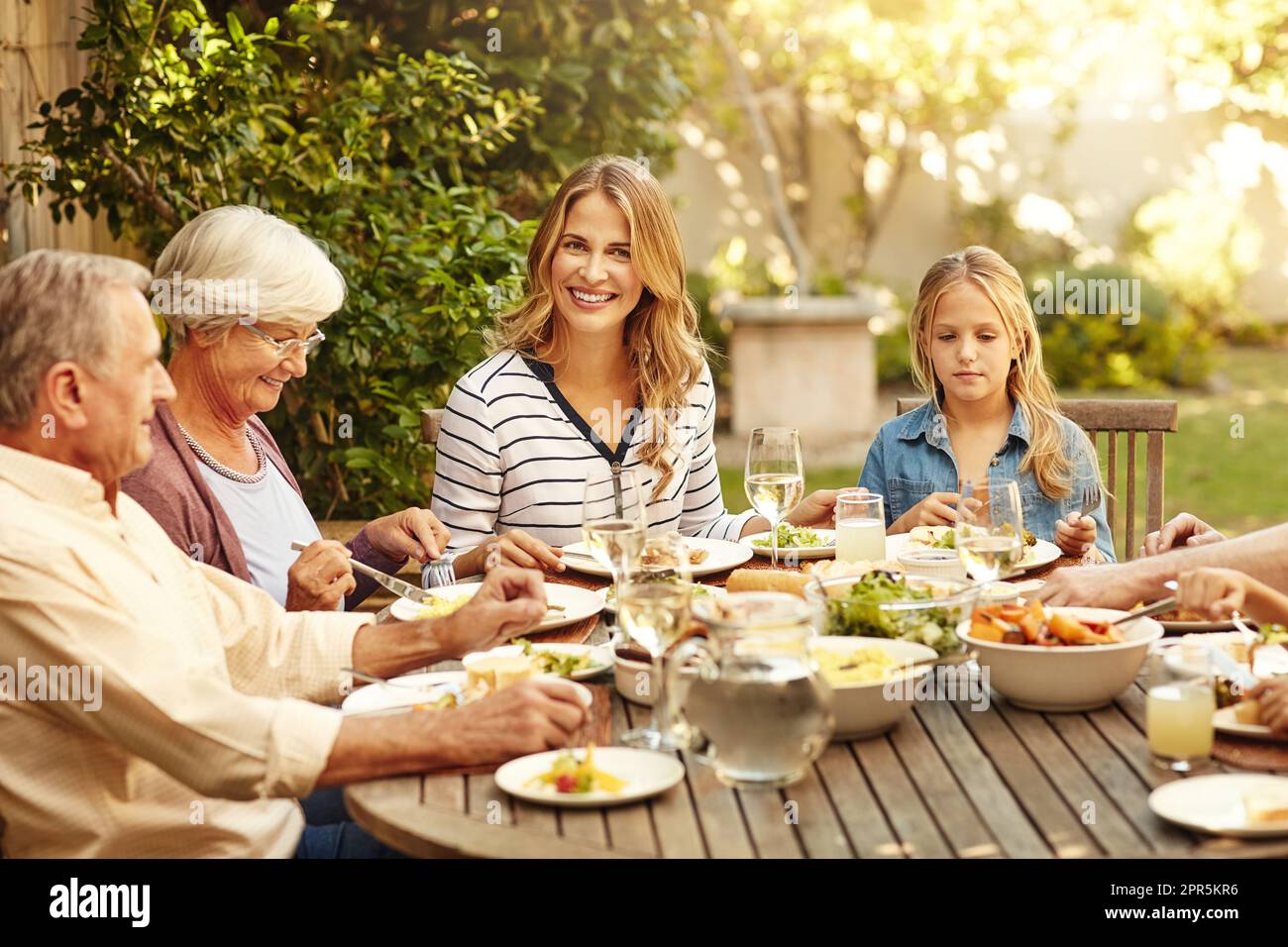 Our family get togethers are always the best. a family eating lunch ...
