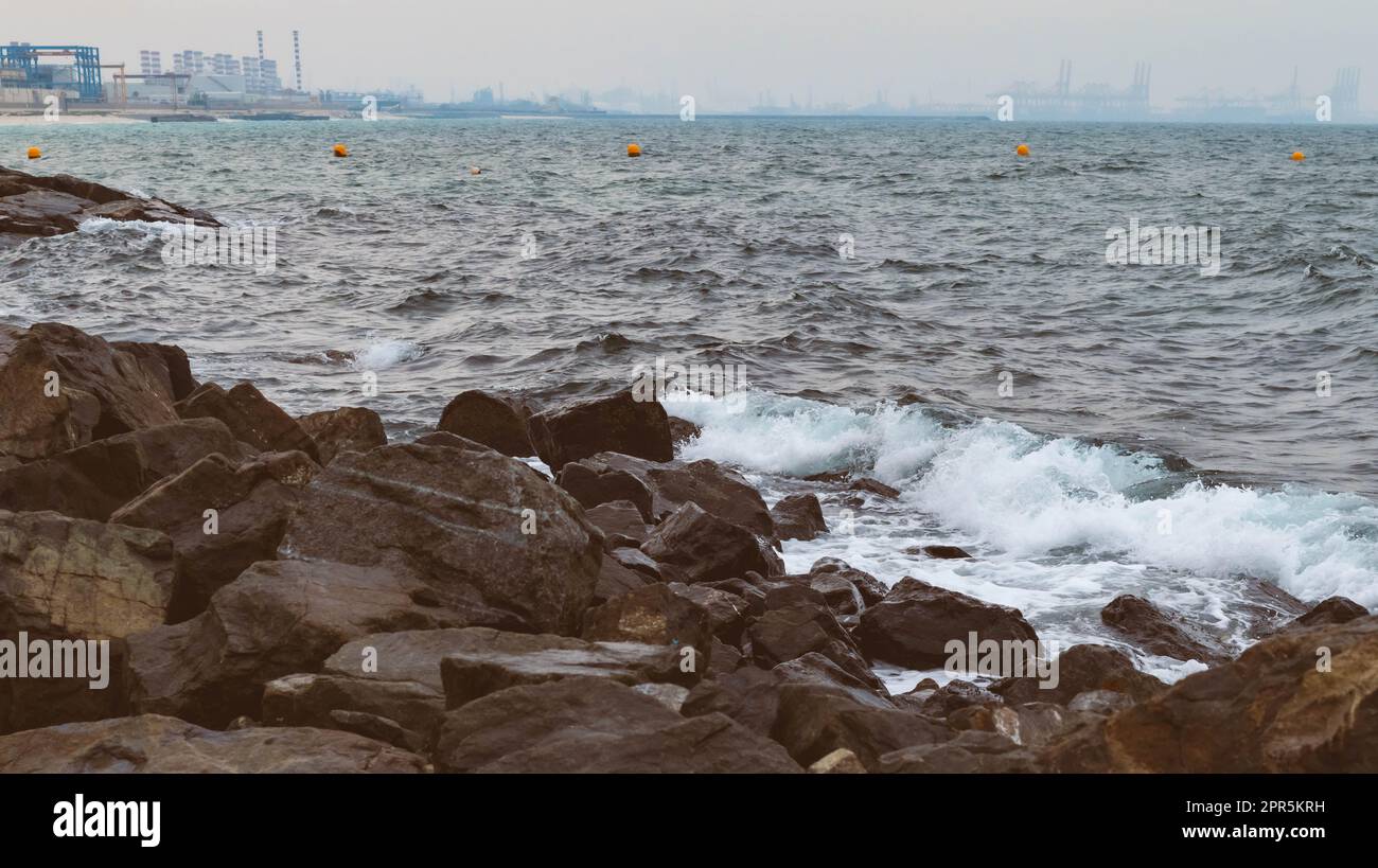 Sea waves with sky and rocks Stock Photo - Alamy