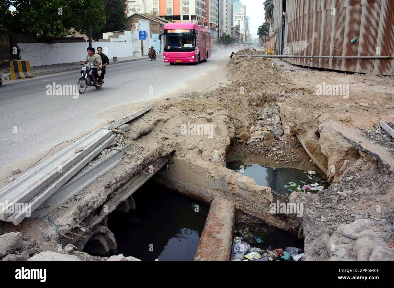 Karachi, Pakistan, April 26, 2023. View of open sewerage and rain drain ...