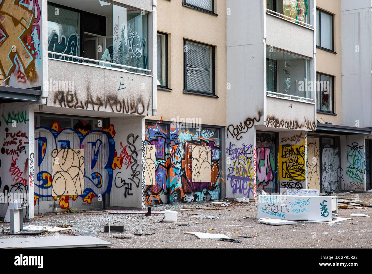 Graffiti covered and vandalized residential building before demolition ...