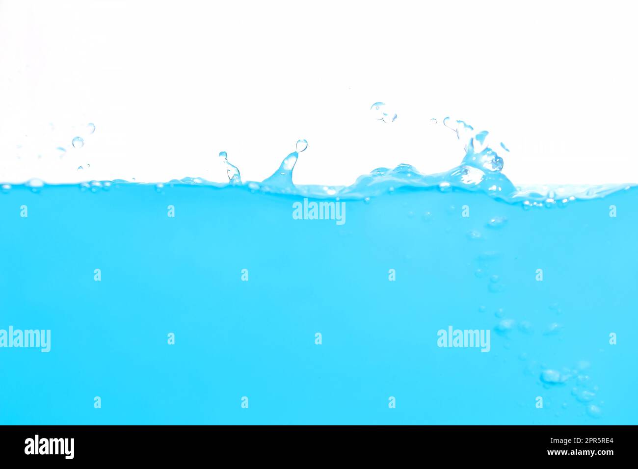 Water splash. Aqua flowing in waves and bubbles . on white background ...