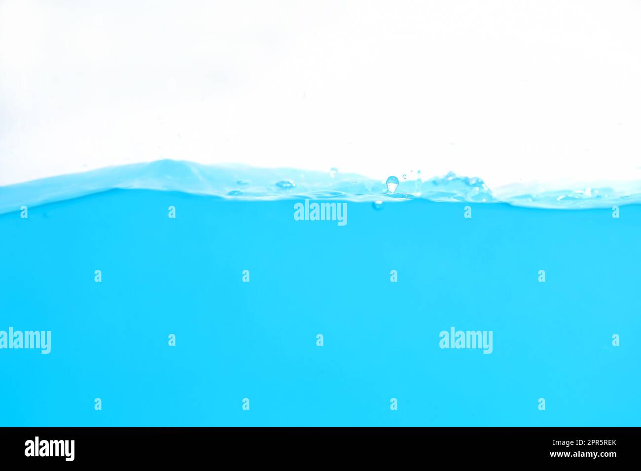 Water splash. Aqua flowing in waves and bubbles . on white background ...