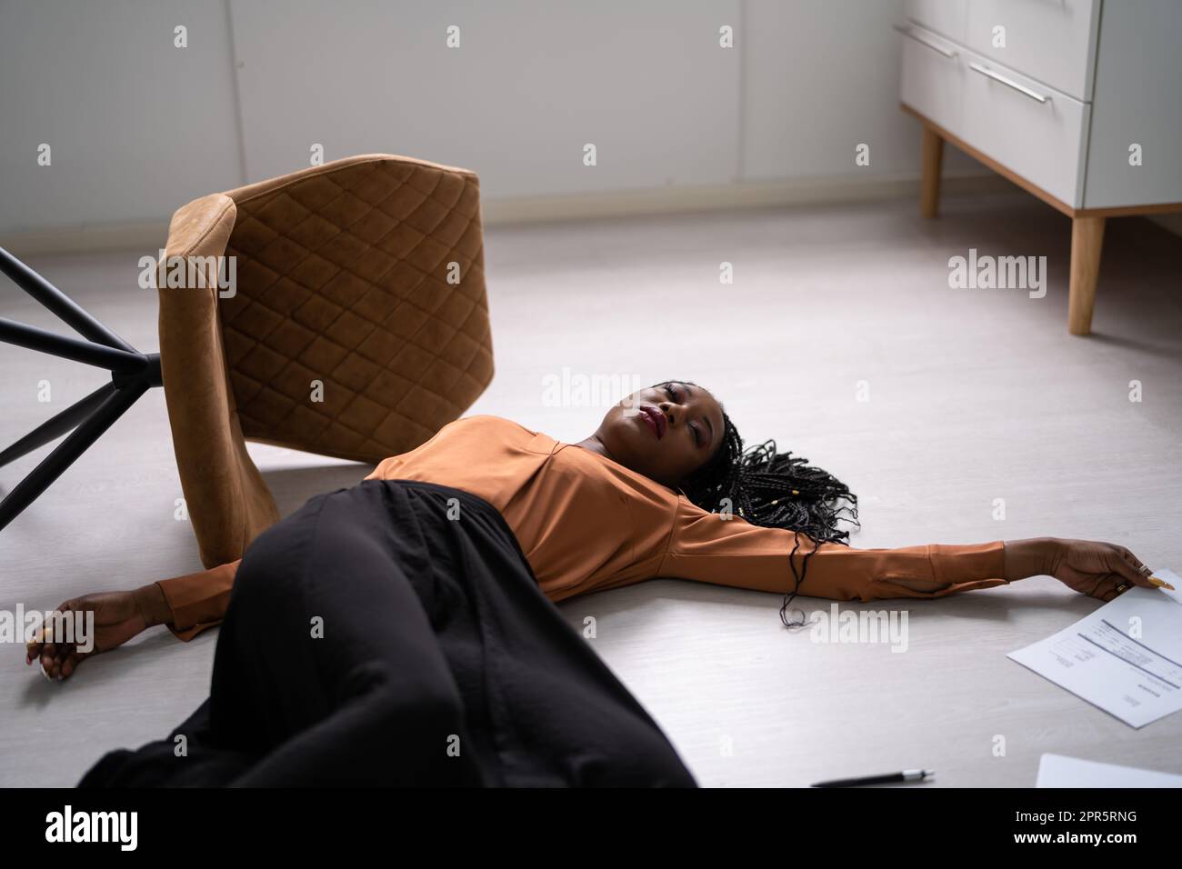 Fallen chair floor hi-res stock photography and images - Alamy