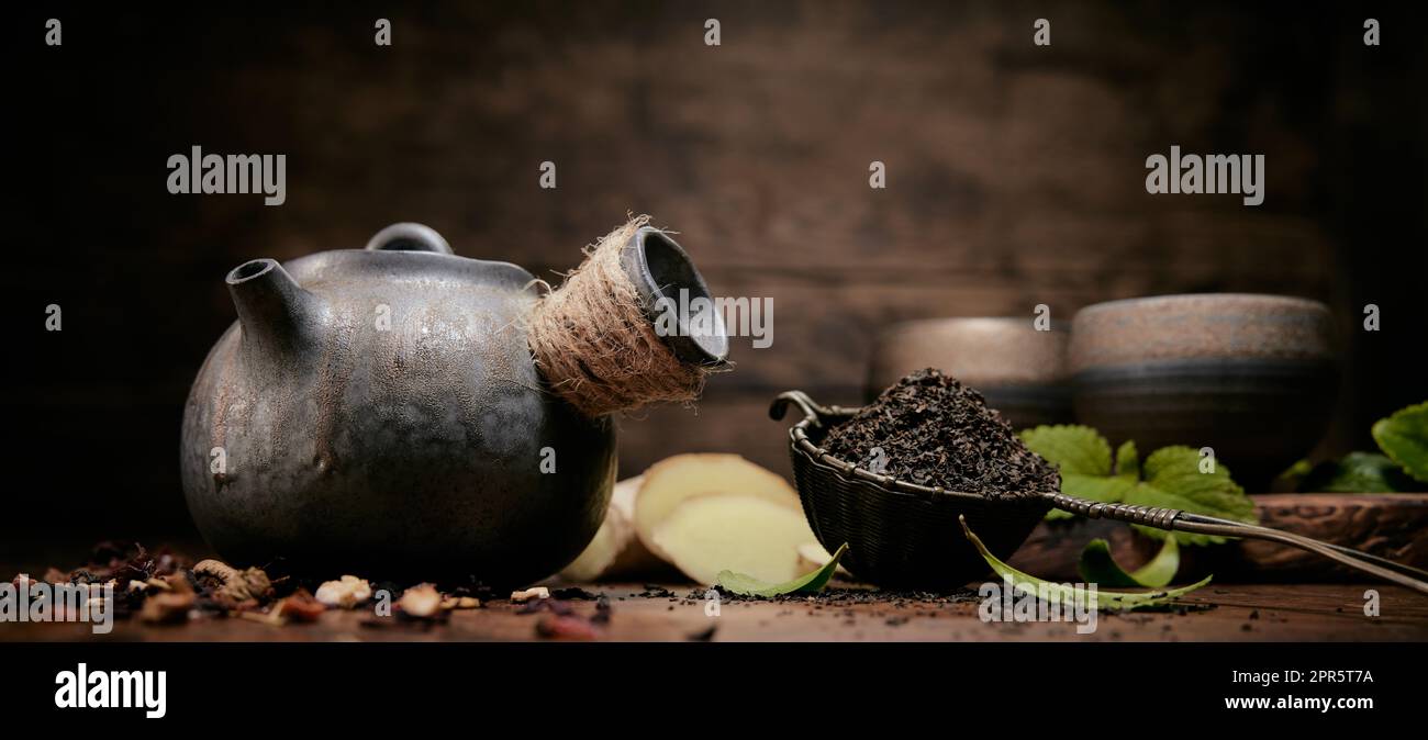Loose tea with retro tea set Stock Photo - Alamy