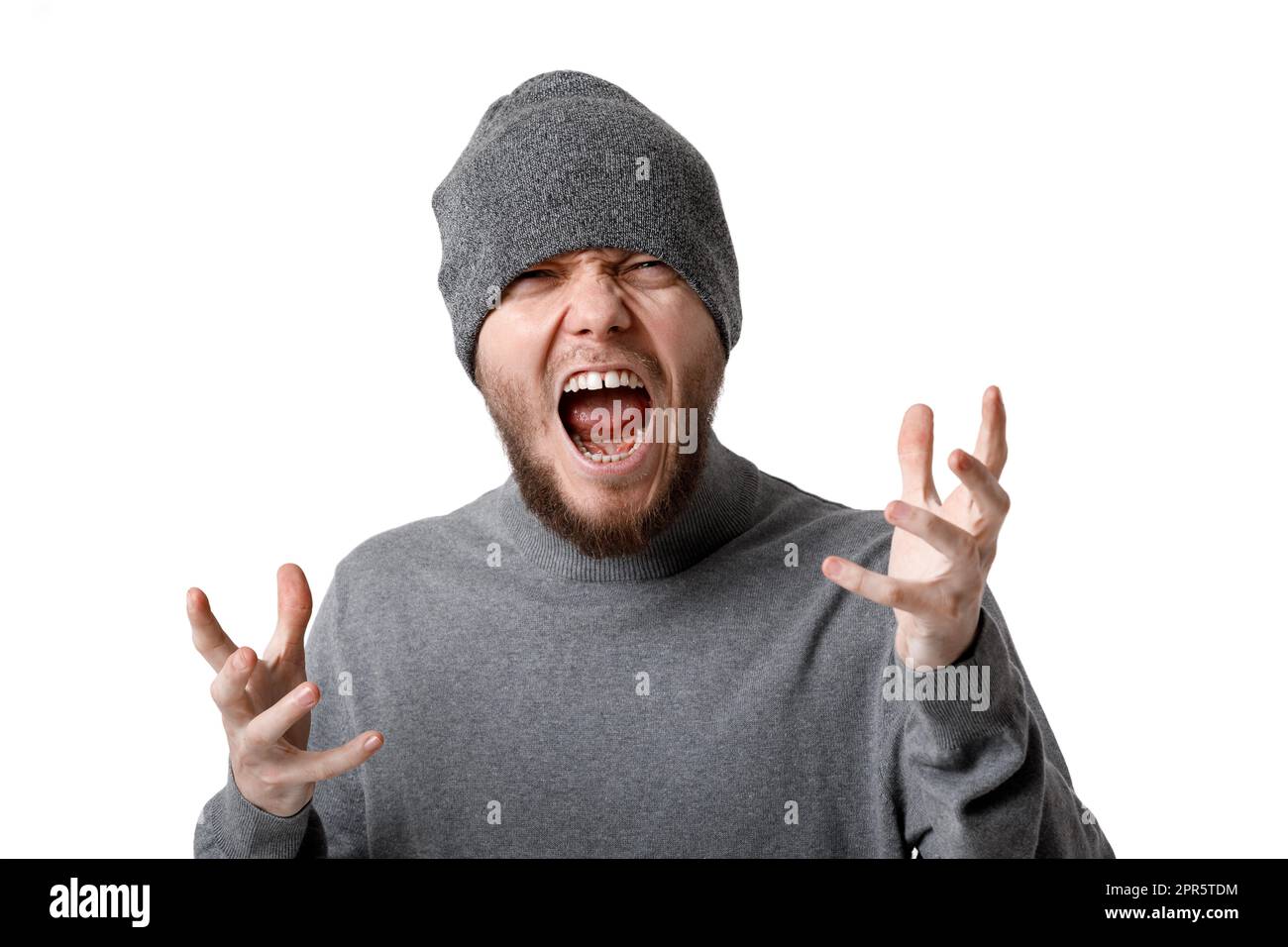 portrait of angry screaming young man in hat Stock Photo - Alamy