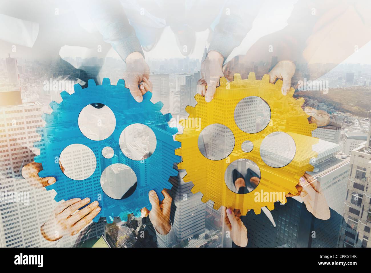 Business team connect pieces of gears like a teamwork and partners ...