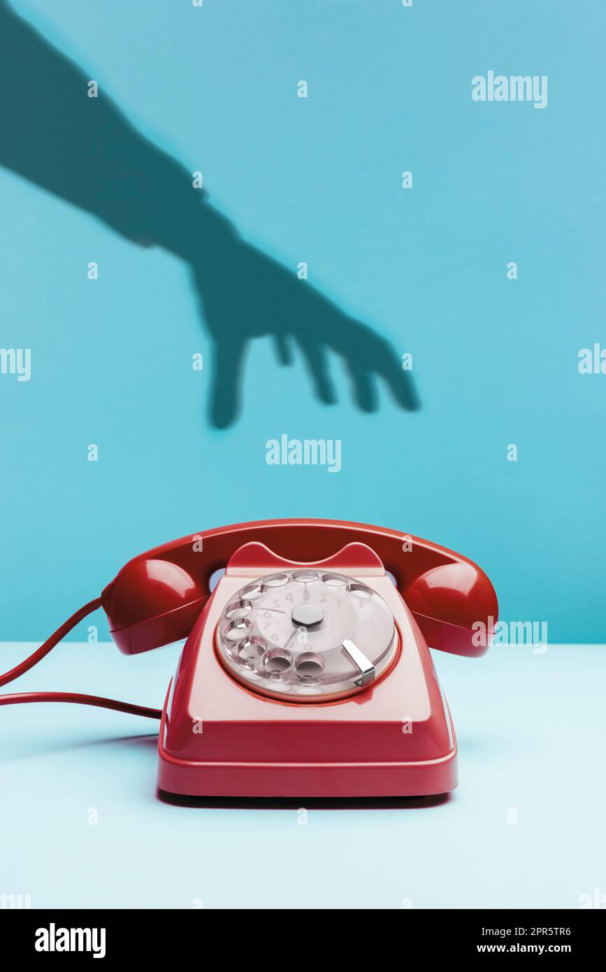 Hand with old phone hi-res stock photography and images - Alamy