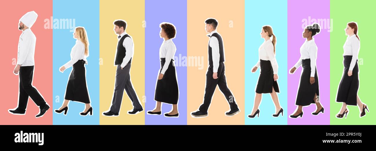Young Restaurant Staff Walking In Row Stock Photo - Alamy