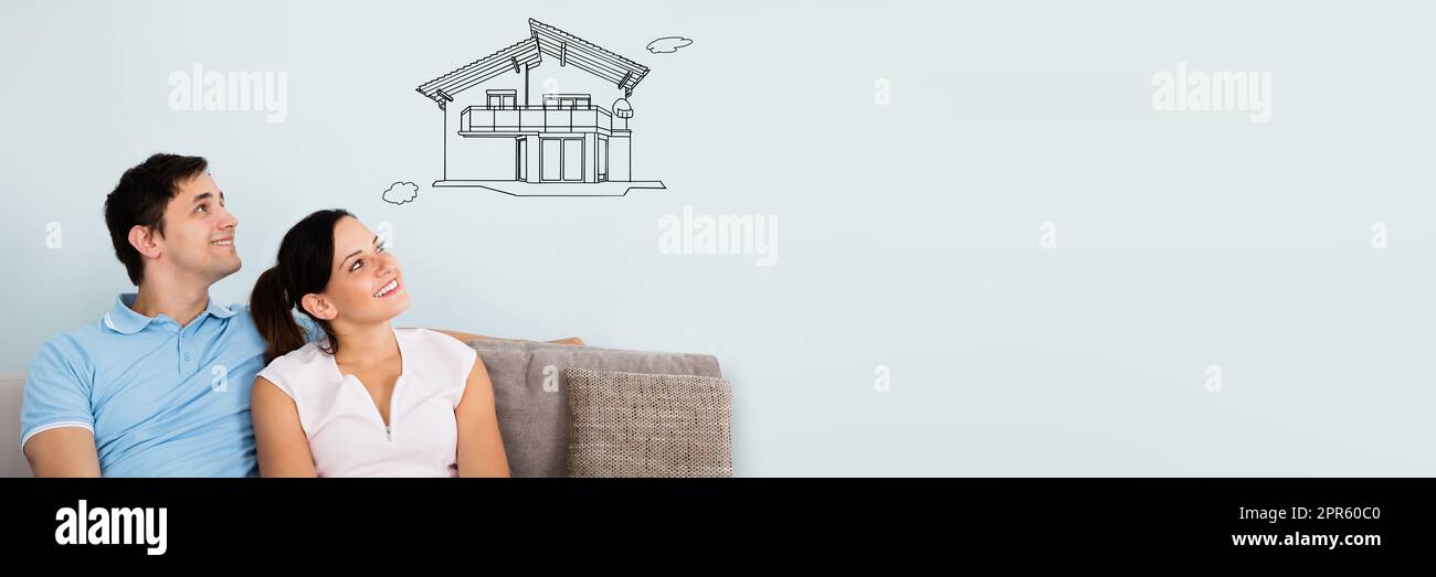 Couple Thinking Of Having Vacation Together Stock Photo - Alamy