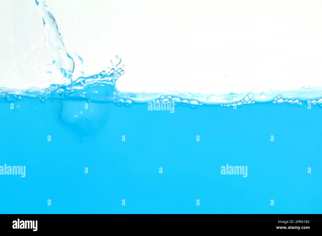 Water splash. Aqua flowing in waves and bubbles . on white background ...