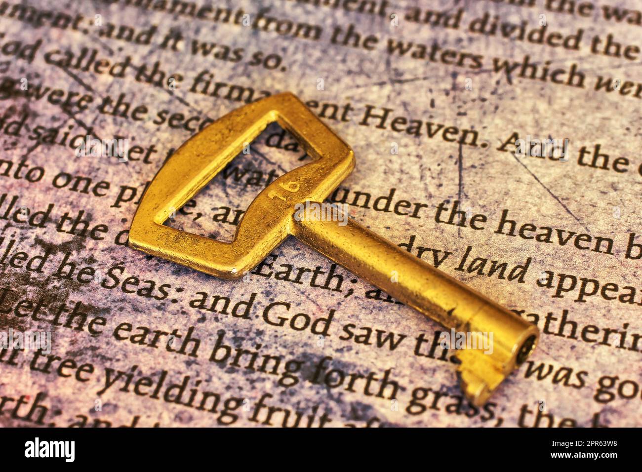 Key on bible Stock Photo - Alamy