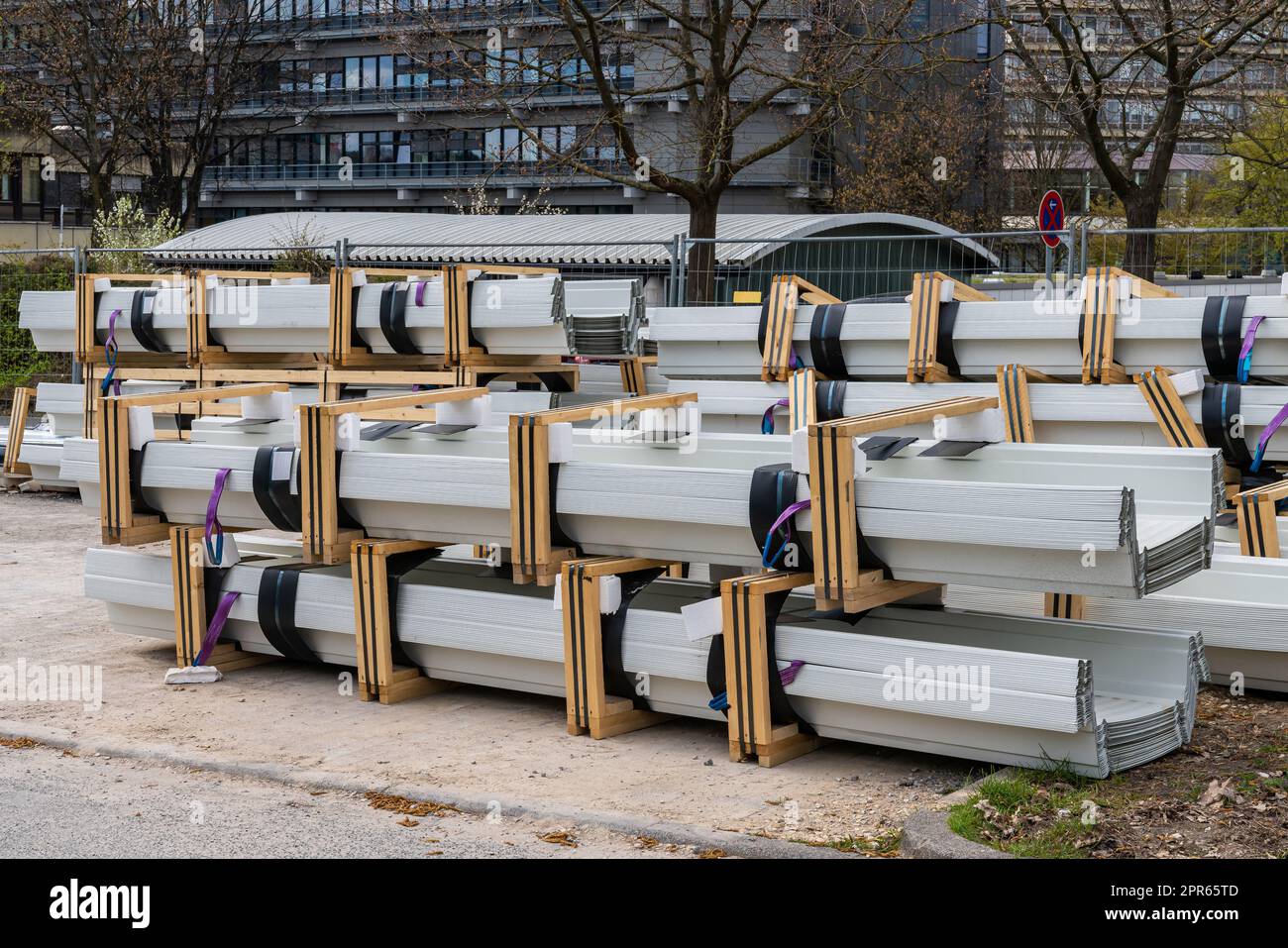 Stacked grey metal tin profiles at a construction site Stock Photo - Alamy