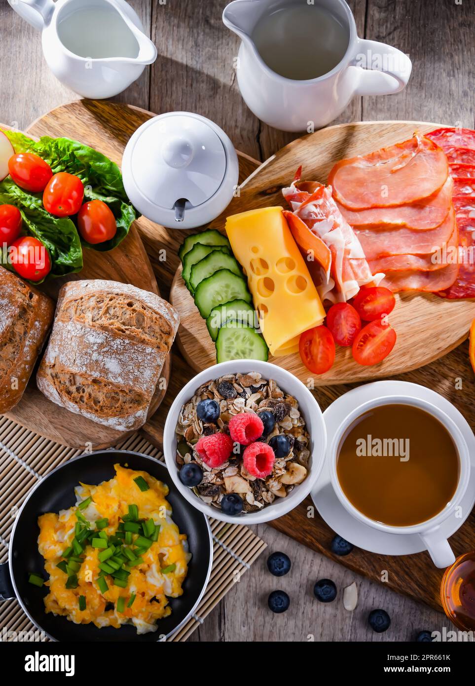 Breakfast served with coffee, scrambled eggs, cereals and ham Stock ...