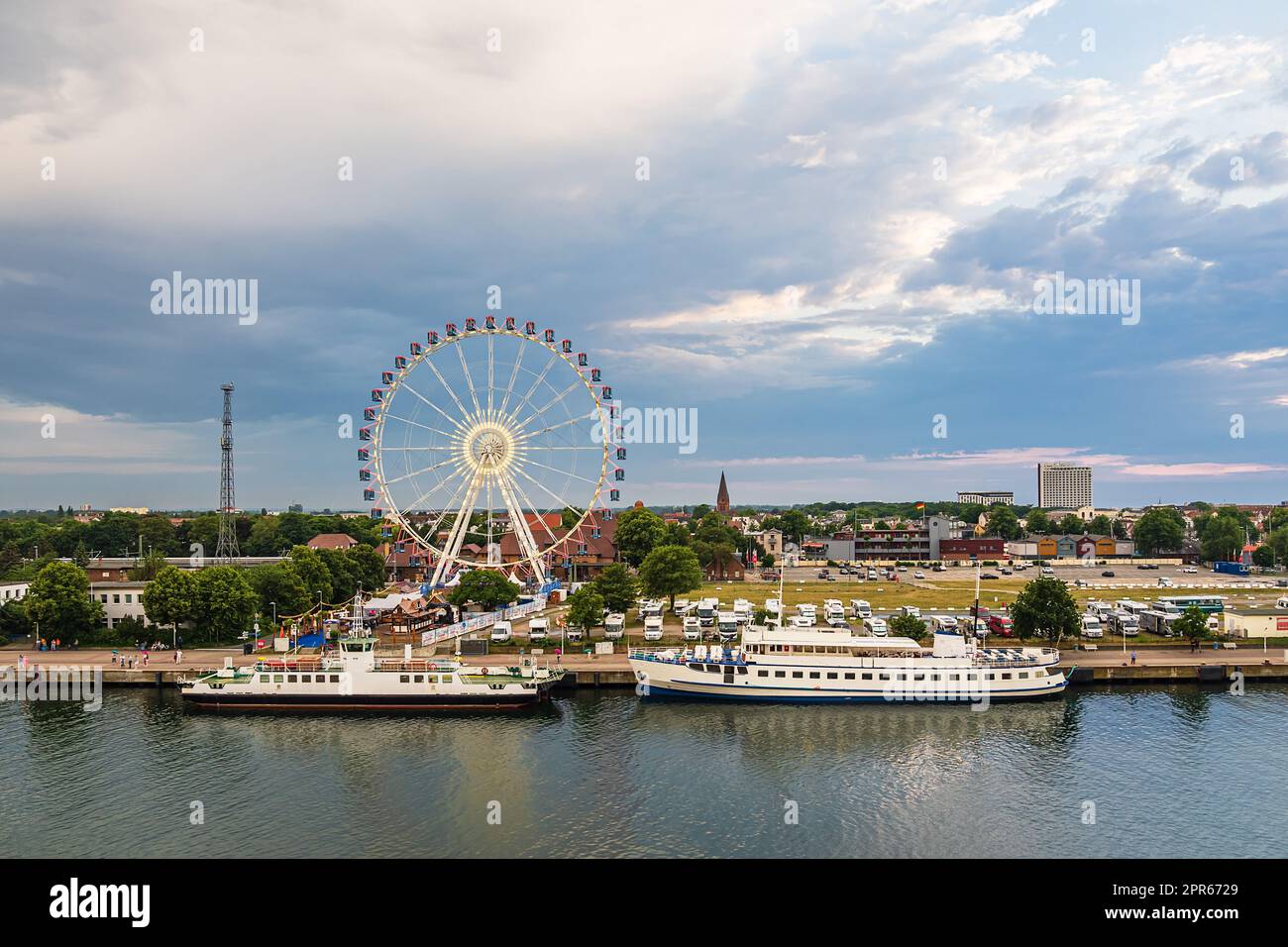Ferris wheel on the Baltic Sea coast in Warnemuende, Germany Stock ...