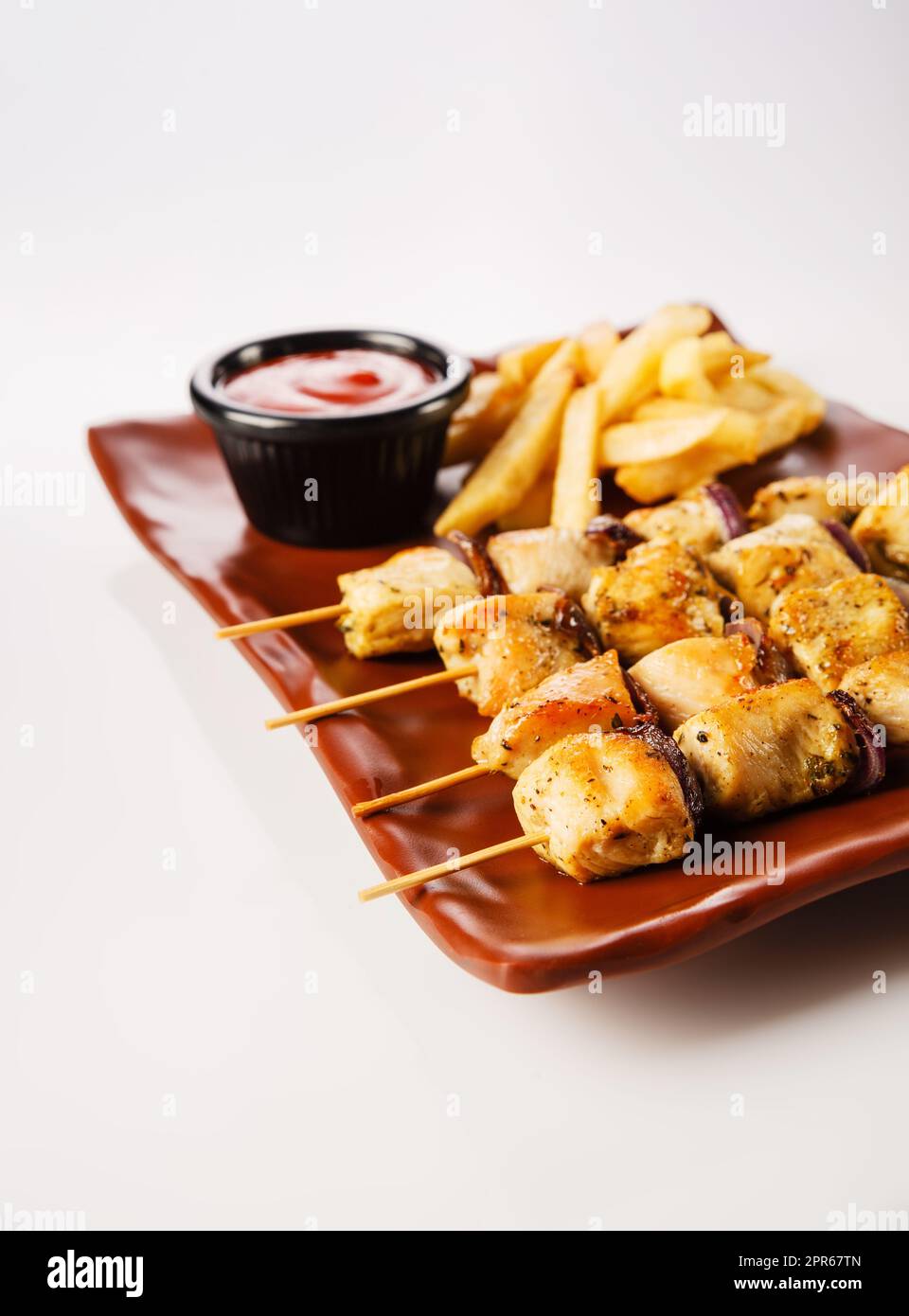 Chicken skewers. Pieces of tender chicken fillet, grilled with sweet ...