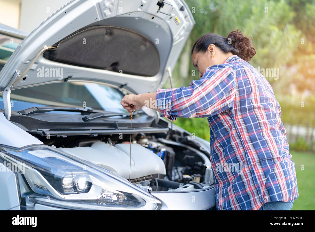 Open hood mechanic engine system to check and repair damage car crash ...