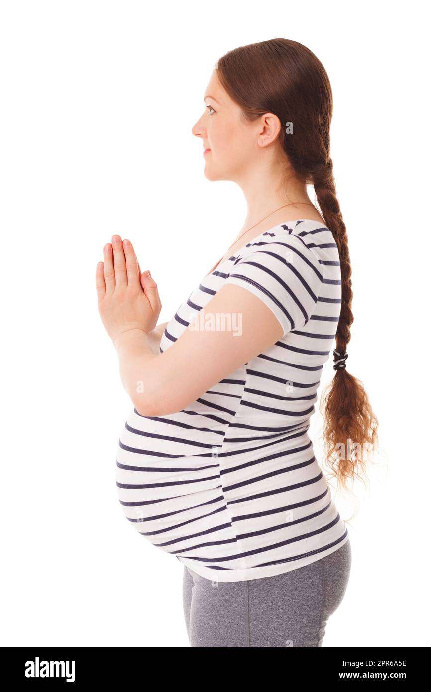 Pregnant woman doing yoga asana asana Tadasana namaste -Mountain pose ...