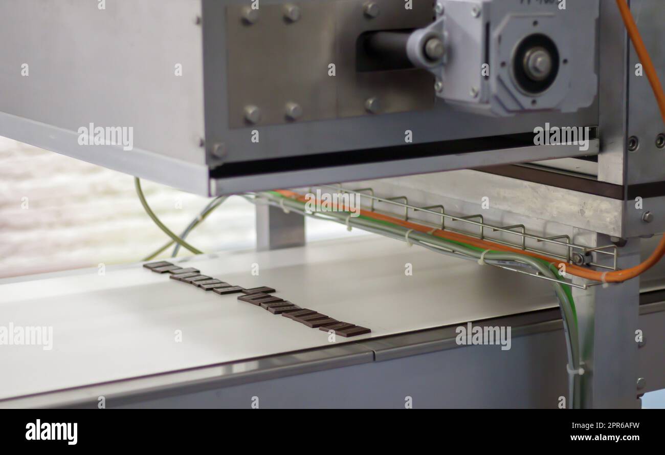 Production of sweets in a chocolate factory. Food industry plant. A ...