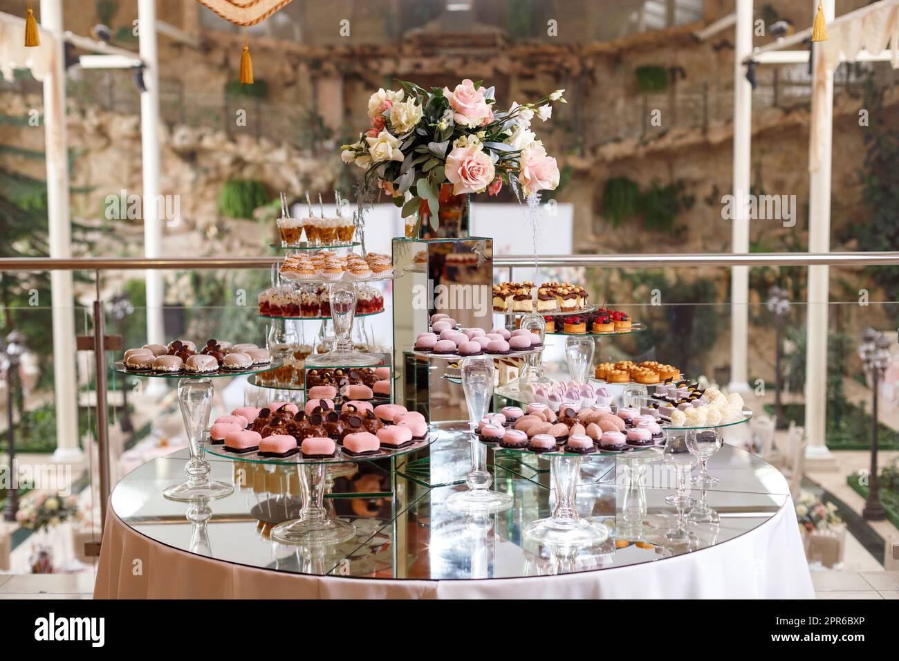 Served festive candy bar table with cupcakes and other desserts Stock ...