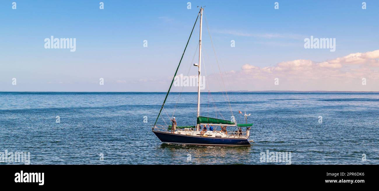 Sailboat sailing at atlantic ocean, piriapolis city, maldonado, uruguay ...