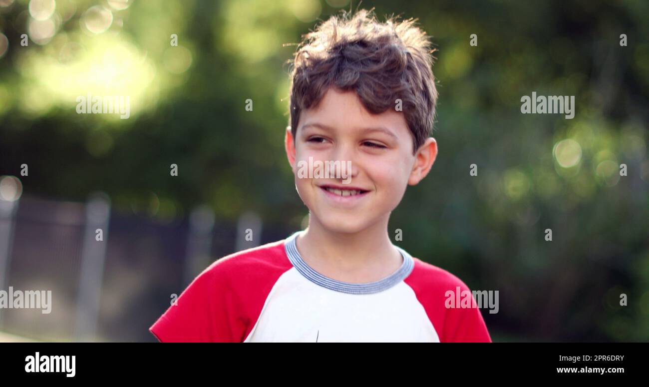 Happy child boy smiling waving hello to camera. Joyful kid face ...