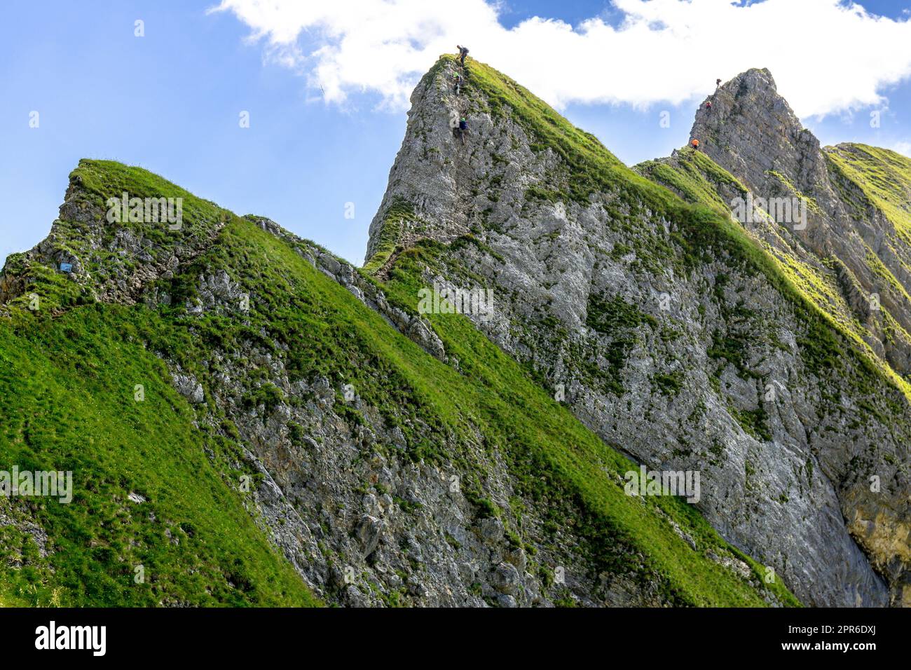 Climbing on the fixed rope route in the Rofan Mountains Stock Photo - Alamy