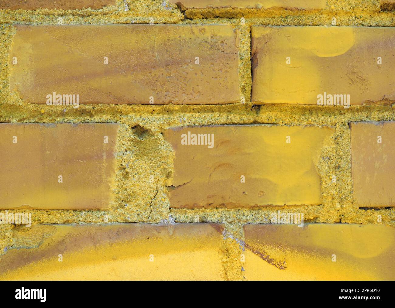 yellow brick wall background Stock Photo - Alamy