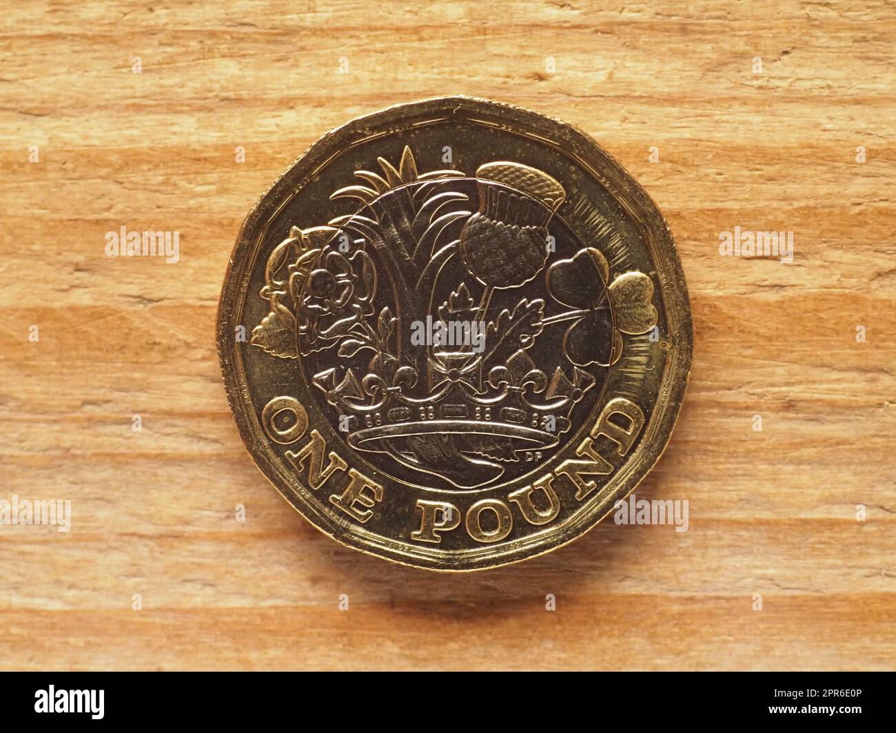 1 Pound coin, reverse side showing Nations of the Crown, currency of ...