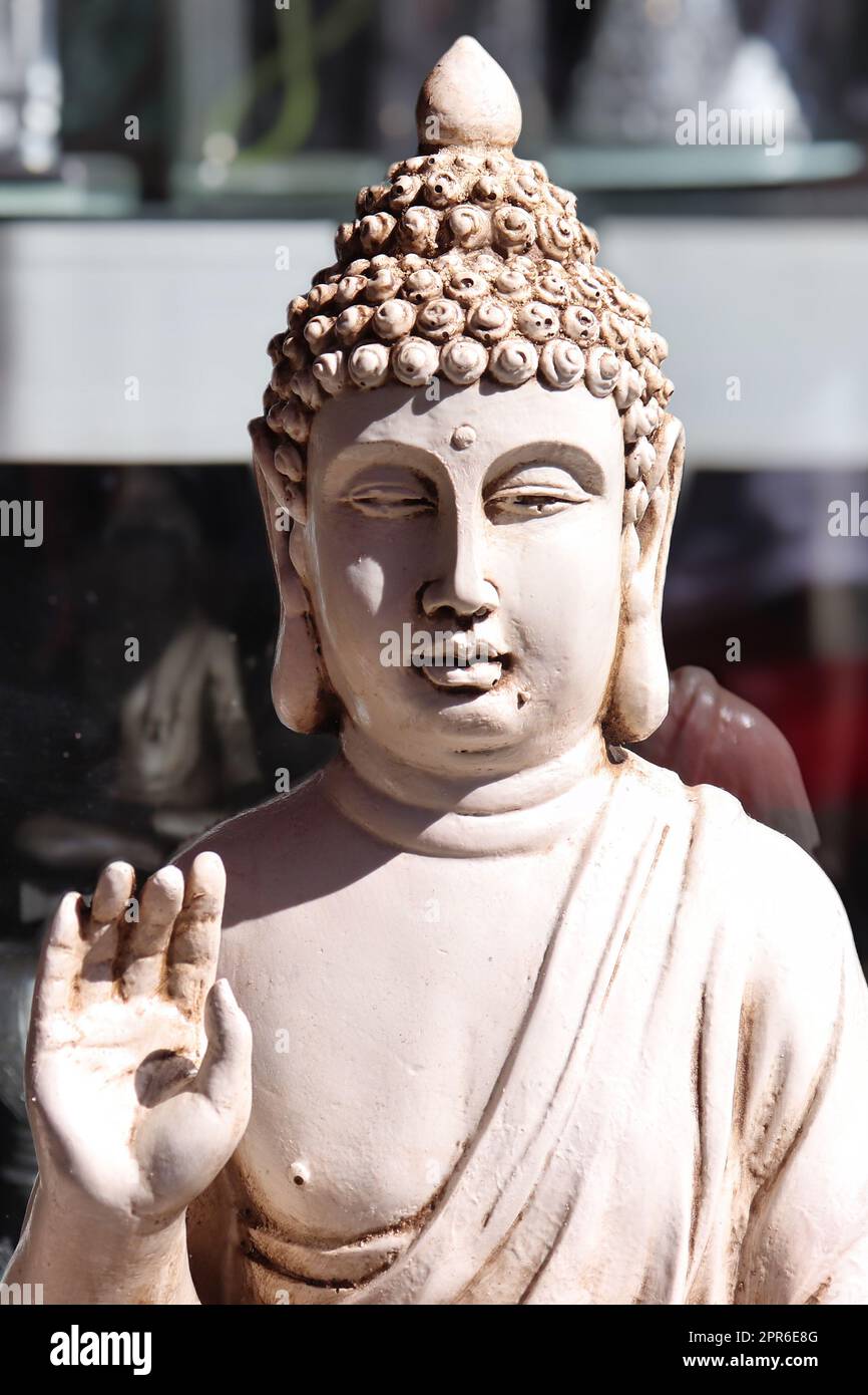 ancient buddha statue giving blessing with hand Stock Photo - Alamy