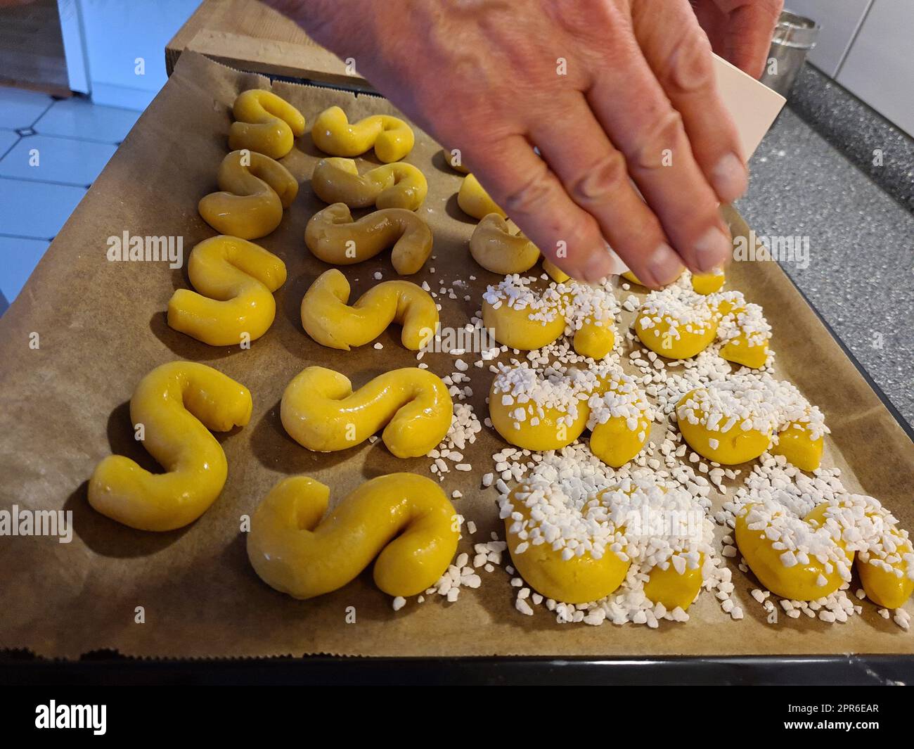 Man making pastries for christmas Stock Photo - Alamy