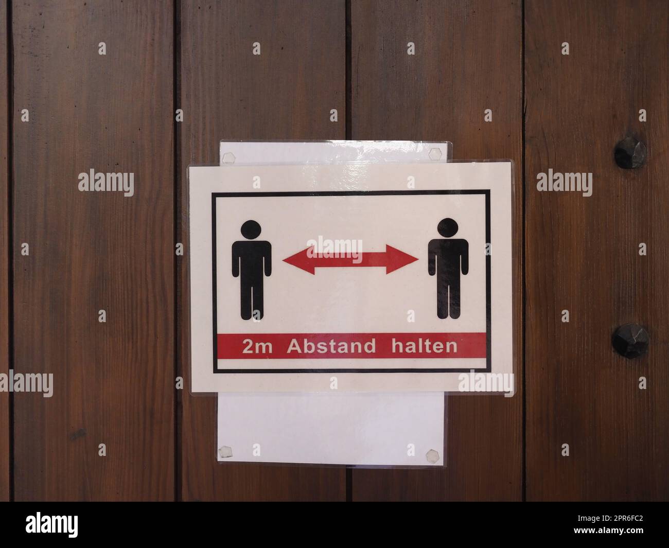 German social distancing sign Stock Photo - Alamy