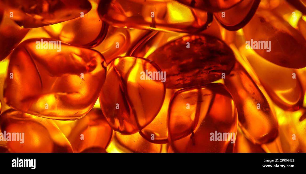 The warm color of amber. Close up of amber Stock Photo - Alamy