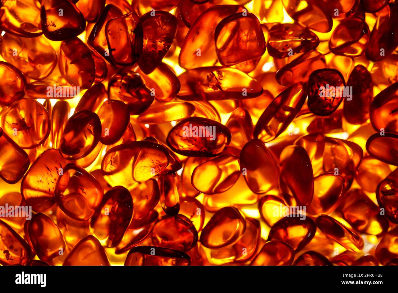 The warm color of amber. Close up of amber Stock Photo - Alamy