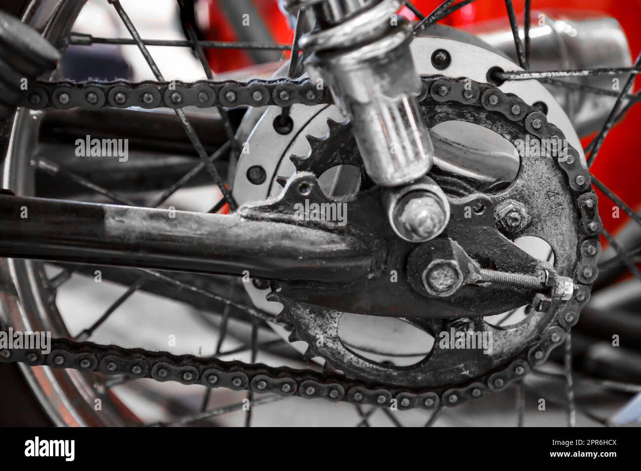 The rear wheel of a motorcycle with the gear for the drive Stock Photo ...