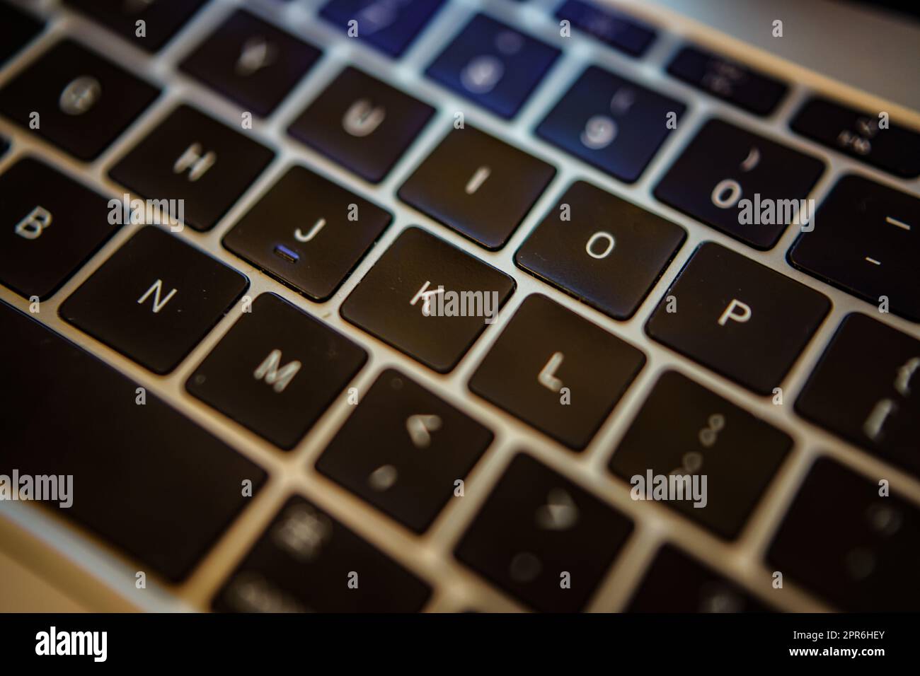 Glowing blue Laptop keyboard image Stock Photo - Alamy