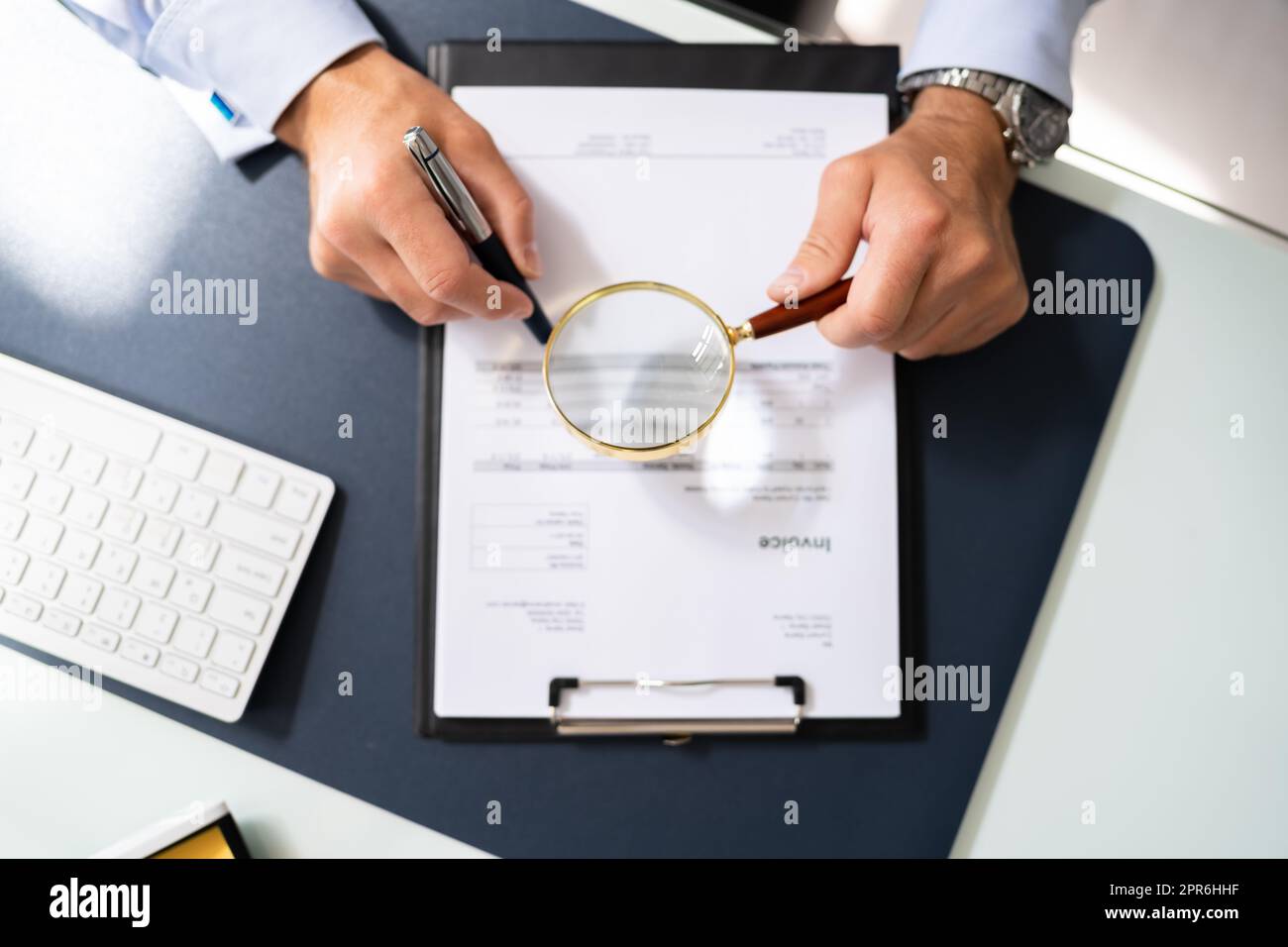 Auditor Doing Tax Fraud Investigation Stock Photo - Alamy