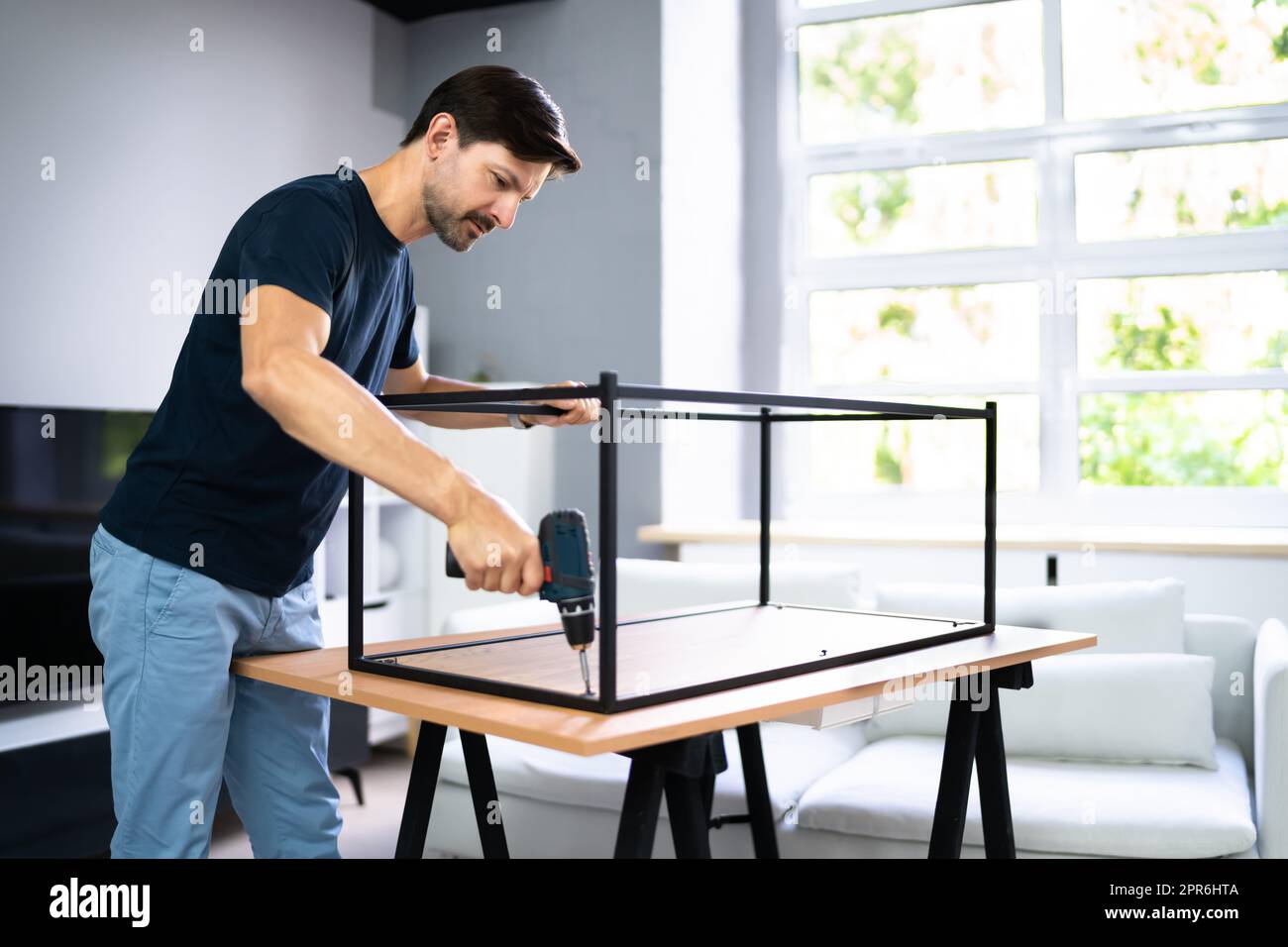 DIY Table Assembly In Domestic Apartment Stock Photo - Alamy