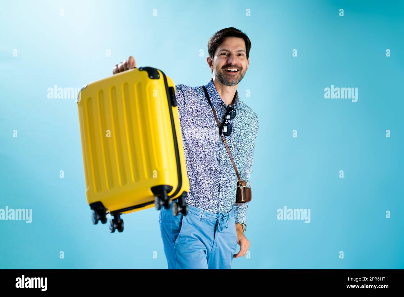 Tourist Man With Suitcase Stock Photo - Alamy