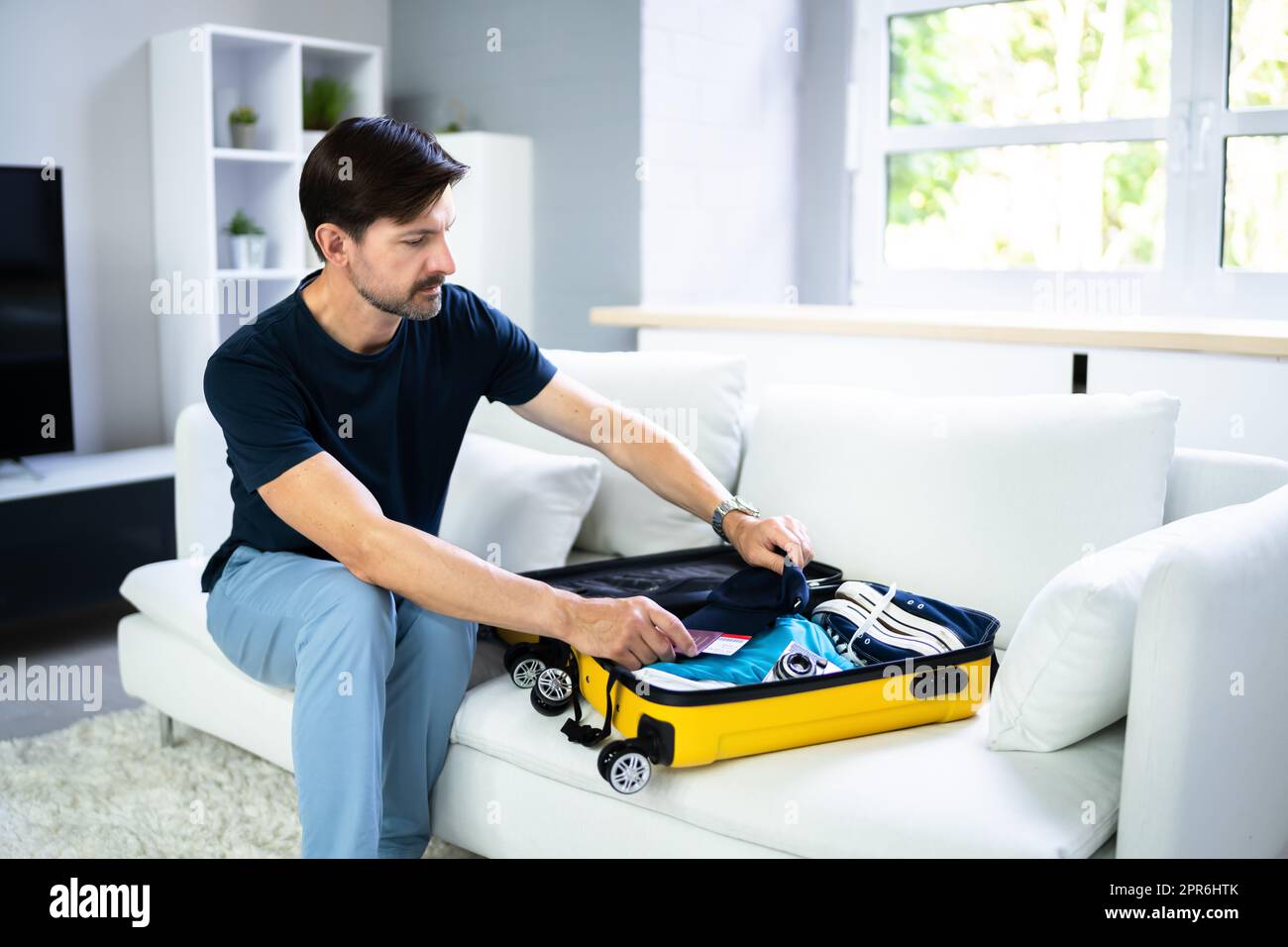Suitcase Luggage Packing For Travel Stock Photo - Alamy