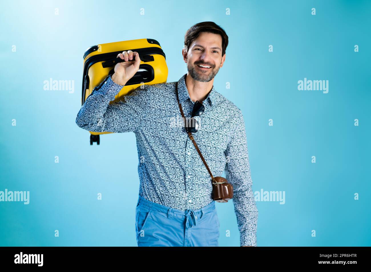Man yellow travel suitcase hi-res stock photography and images - Alamy