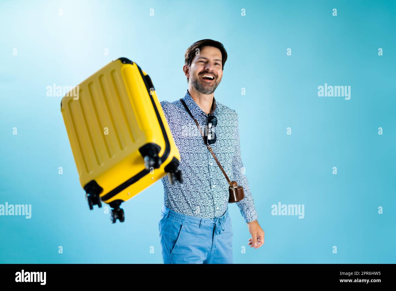 Tourist Man With Suitcase Stock Photo - Alamy