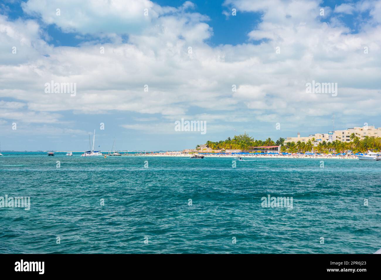 Port with sailboats and ships in Isla Mujeres island in Caribbean Sea ...