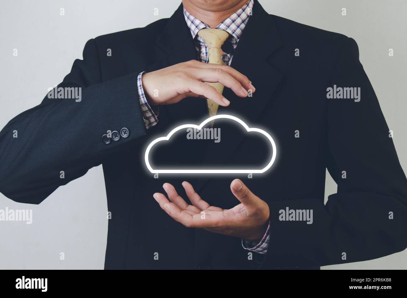 business man holding cloud computer network icon and data connection ...