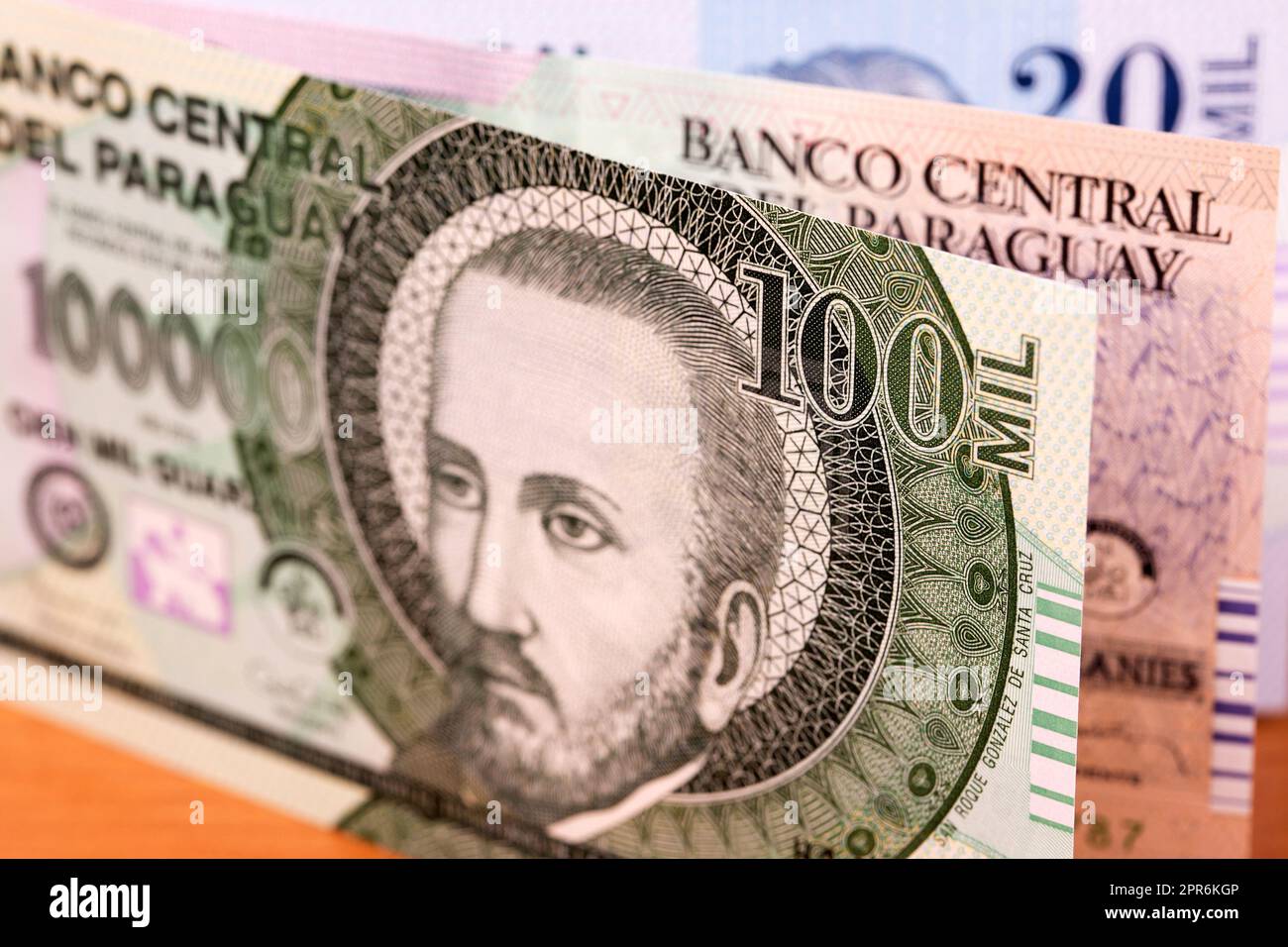 Paraguayan guarani a business background Stock Photo - Alamy
