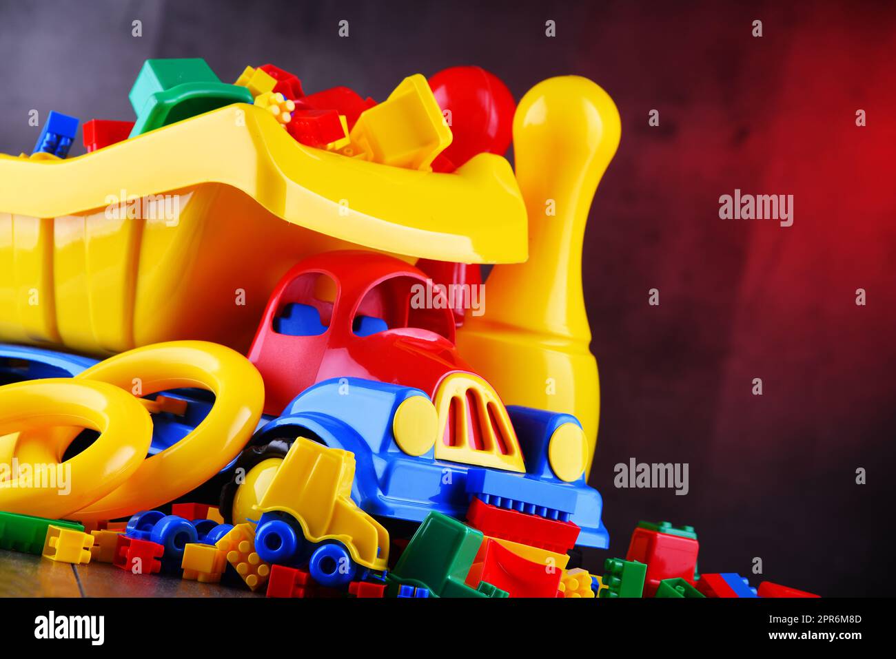 Composition with colorful plastic children toys Stock Photo - Alamy