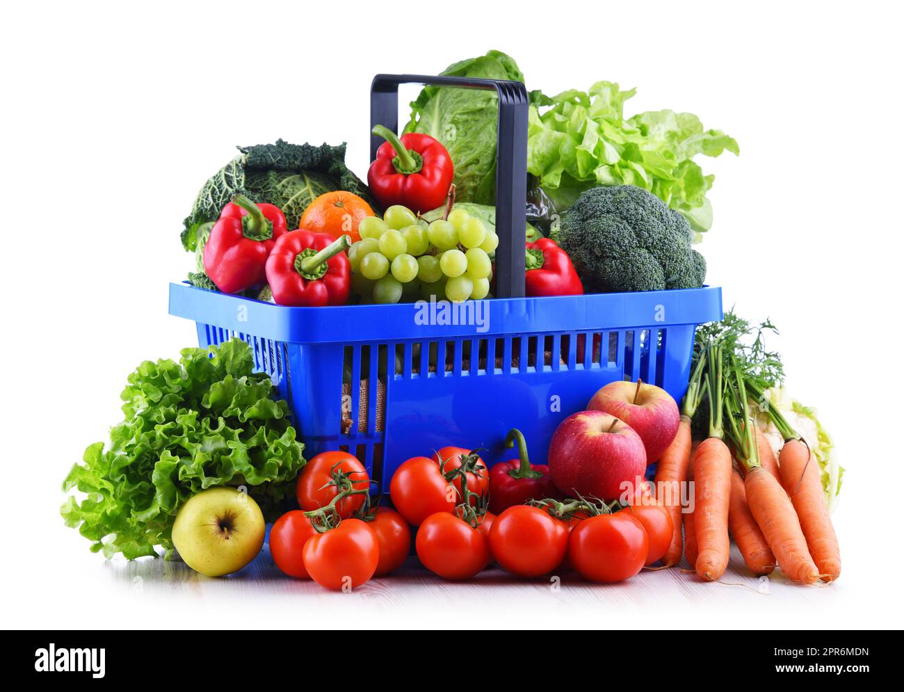 Fresh organic fruits and vegetables in plastic shopping basket Stock ...